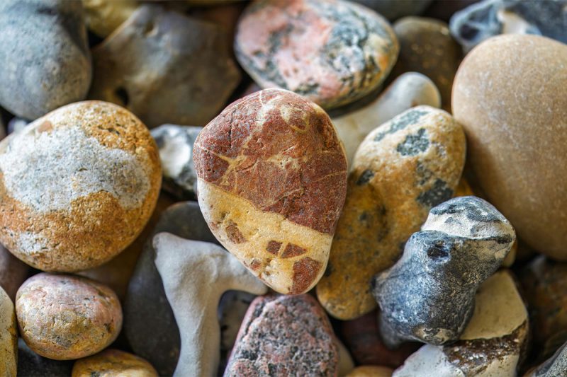 Transform Your Outdoor Space with Decorative Stones This Summer